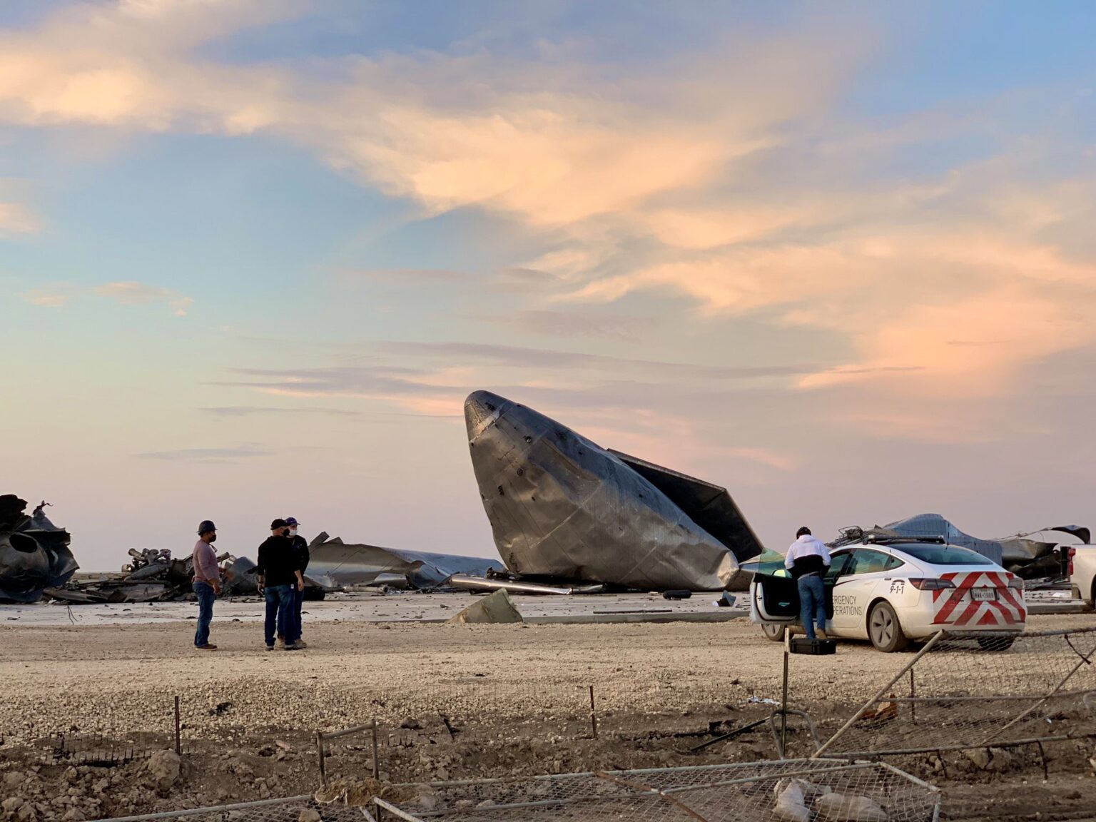 Elon Musk and the SpaceX team inspects the remains of Starship SN8 ...