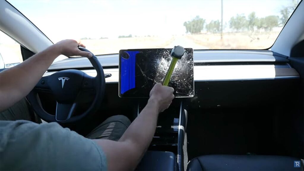 Watch what happens when the Tesla Model 3 screen is smashed with a ...