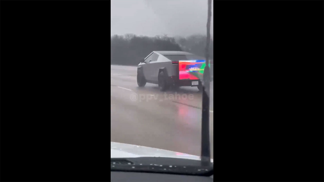 Cybertruck spotted with a large screen mounted on its back displaying ...