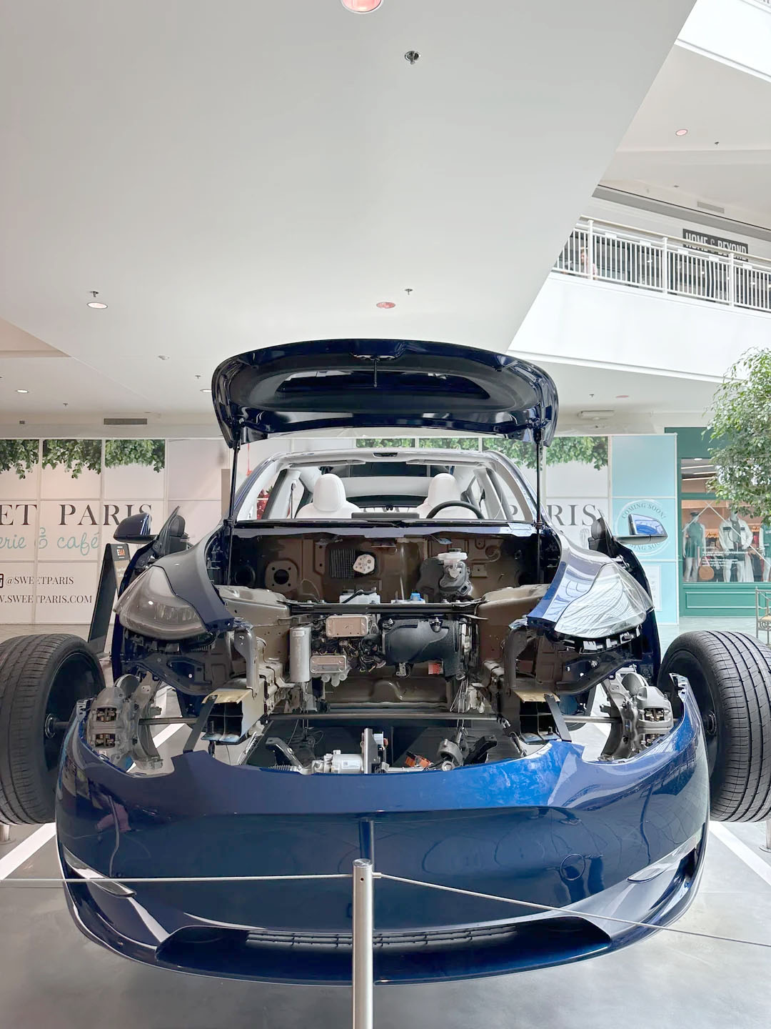 Look at the exploded view of Tesla Model Y on display at the Mall of ...