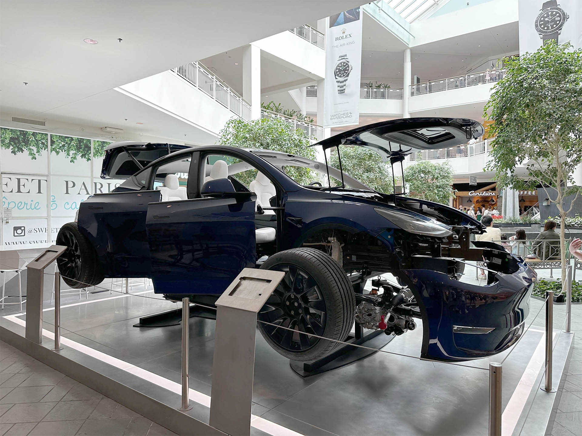 Look at the exploded view of Tesla Model Y on display at the Mall of ...